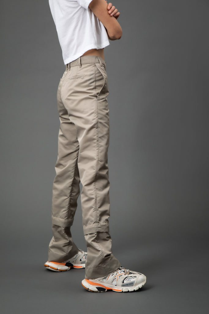 Sand tan color Pants in water resistant nylon with bottoms that unzipp ...